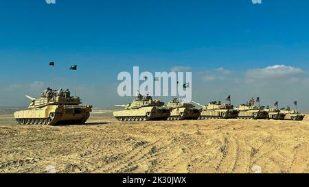 Several M1 Abrams tanks of the Royal Saudi Land Force and the U.S. Army ...