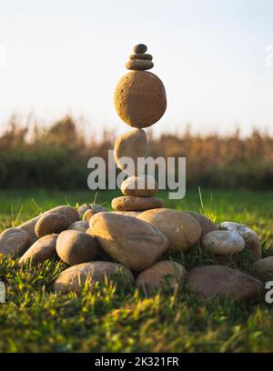 Group of stones on field Stock Photo - Alamy