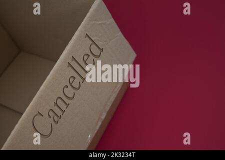 Cancelled word with cardboard box. Brown folded card box Stock Photo ...