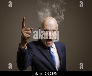 Angry boss shouting at camera, he is scolding an employee Stock Photo ...