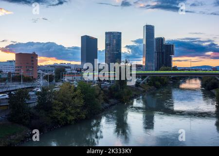 Wien, Vienna: river Donaukanal, high-rises Wien Energie headquarters ...