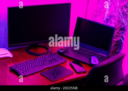 Creative designer's workplace, back view. Office chair and work desk ...