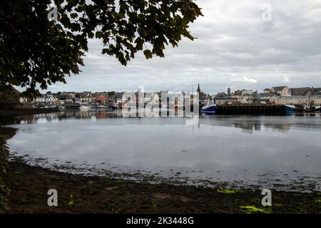 Rows of houses and shops lining the seafront at Stornoway harbour ...