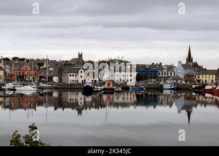 Rows of houses and shops lining the seafront at Stornoway harbour ...