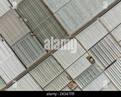 Masses of shimmering plastic greenhouses near El Ejido, aerial view ...