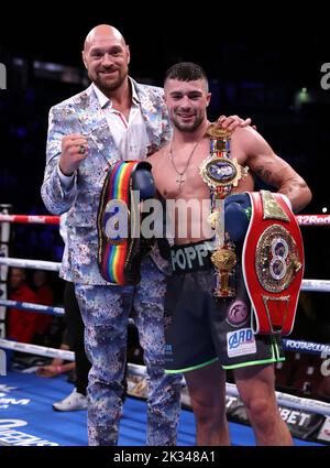 Mark Heffron (right) celebrates victory with Tyson Fury after the ...