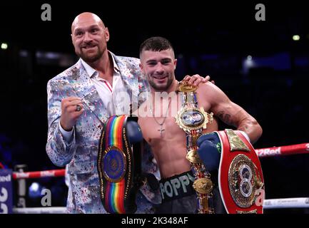 Mark Heffron (right) celebrates victory with Tyson Fury after the ...
