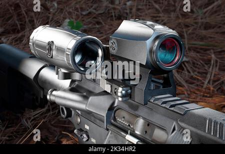 Magnifier on the side of a red dot scope on an AR-15 Stock Photo - Alamy