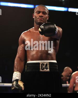 Cheavon Clarke celebrates victory in the cruiser weight bout at the OVO ...
