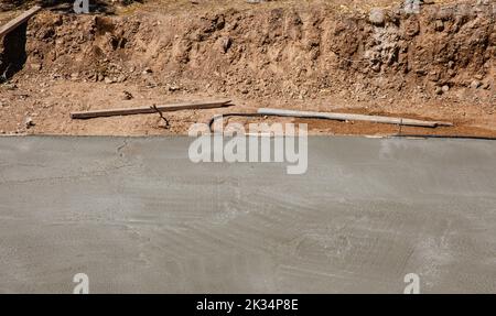 slab-on-grade foundation on construction site. busy construction site ...