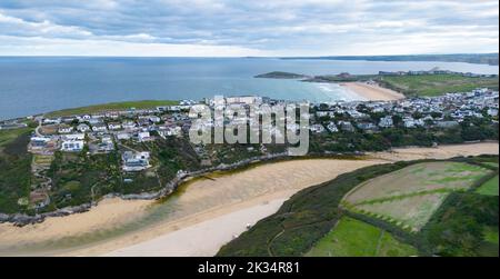 An aerial view of the village of Pentire high on a headland overlooking ...