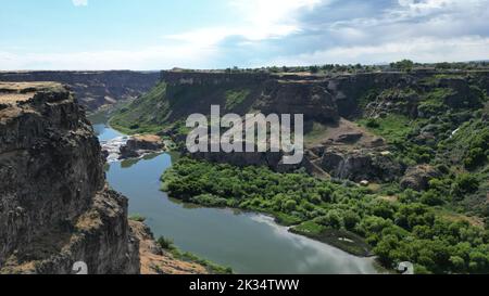 A greenish river between cliffs in a summer day Stock Photo - Alamy