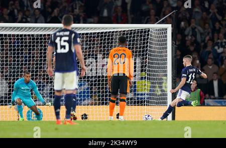 Scotland's Ryan Christie (right) scores his sides second goal of the ...