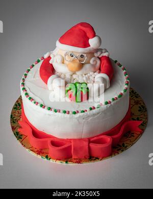 Front view christmas cake with santa decoration Stock Photo - Alamy