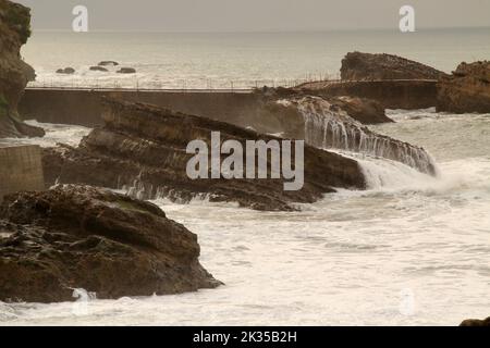 A grayscale shot of a rocky beach Stock Photo - Alamy