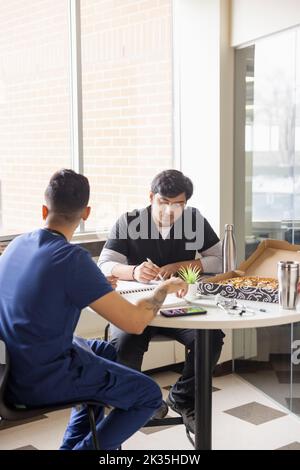 The two medical students studying in classroom Stock Photo - Alamy