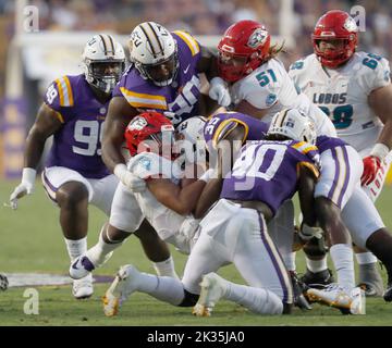LSU defensive end Sai'vion Jones runs through drills during the school ...