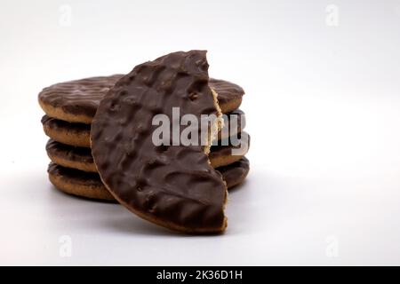 Pile of chocolate digestive biscuits Stock Photo - Alamy