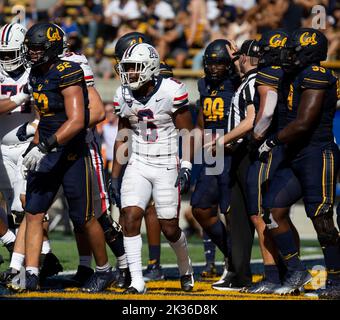 Arizona running back Michael Wiley (6) scores a touchdown between Utah ...