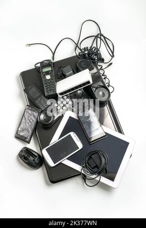 Electronic waste ready to recycle, isolated on white background. pile ...