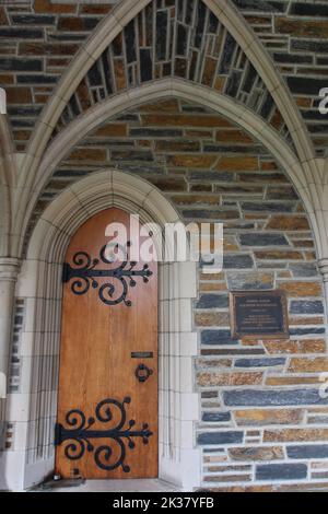 The arched entryway of the Duke University Chapel, carved from stone ...