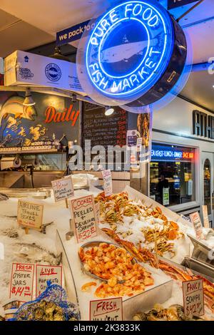 Food stand with fish and seafood on night market, Thailand Stock Photo ...