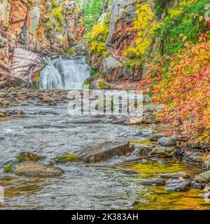 waterfall and fall colors along tenderfoot creek in the little belt ...
