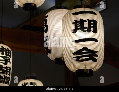 A Japanese four-character idiom, "Ichi-go ichi-e", on lanterns in a ...