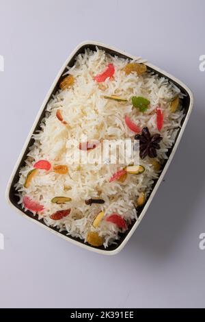 Star anise placed on cooked rice with use of selective focus on a ...