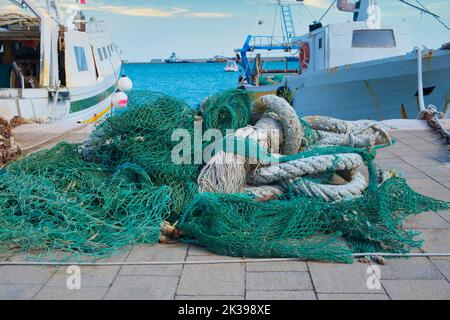 A scenic shot of boats ducked in the coastal city of Piran Slovenia ...