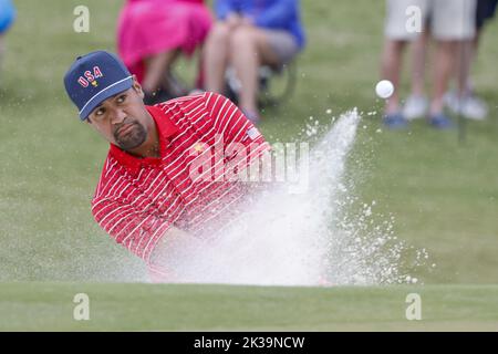 Tony Finau hits out of a bunker on the 13th hole during a practice ...