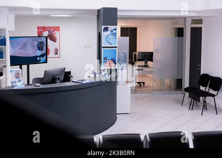 Facility registration counter in waiting area lobby, computer to make ...