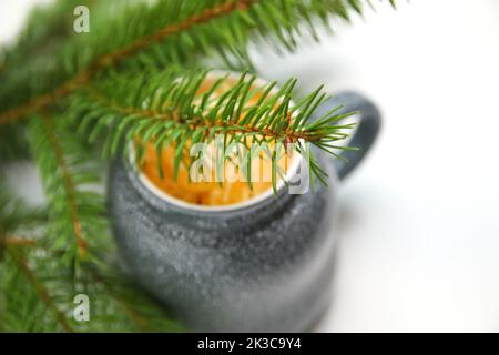 Close-up mug of lobule orange mandarin or tangerine on green natural ...