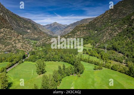 Aerial view of Ribera de Cardós and the surrounding green fields in the ...
