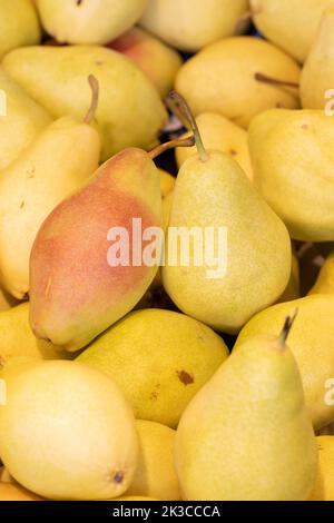 pile of ripe pears as a background at market Stock Photo - Alamy