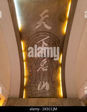 A landscape of ancient pagan buildings at the foot of a mountain in ...