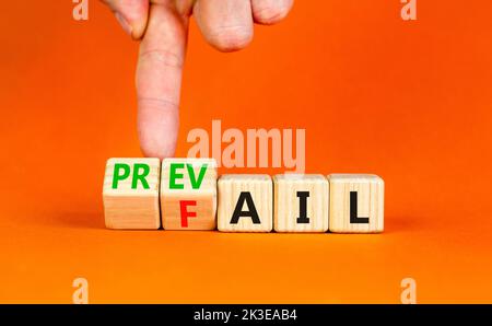 Prevail or fail symbol. Concept words Prevail or Fail on wooden cubes ...