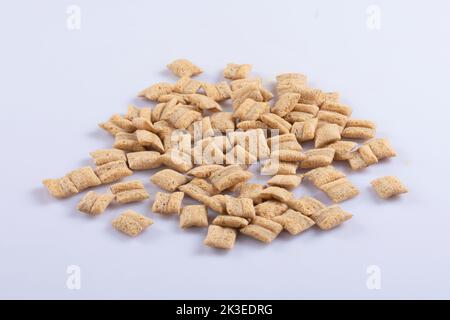 Pillow chips isolated in white background Stock Photo - Alamy
