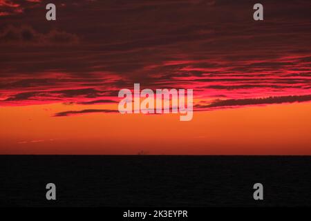 Red fire blood sunset with cloudy sky Stock Photo - Alamy