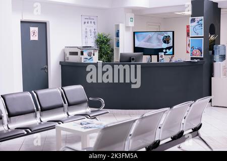 Facility registration counter in waiting area lobby, computer to make ...