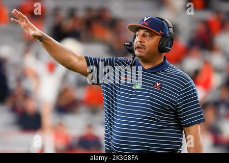 Virginia head coach Tony Elliott watches a replay on the scoreborad ...