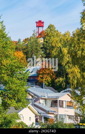 Autumnal foliage on Pispala ridge with red Pispala Shot Tower ...