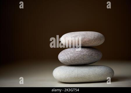 Searching for ones inner balance. Three stones balanced on top of each ...