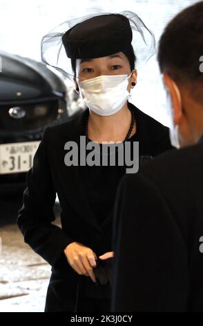 TOKYO, Japan - Japanese Princess Akiko is carried by security guards ...
