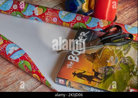 Berlin, Germany - September 25, 2022: Board game with wrapping paper ...