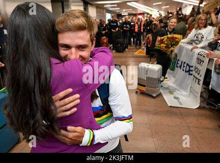 Belgian Remco Evenepoel and his girlfriend Oumi Rayane sit in a ...
