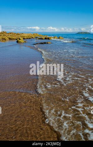 Sandy beach near Mull of Kintyre Scotland in evening light with worm ...