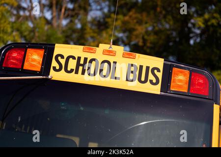 Yellow school bus with new amber and red warning lights. Ontario Canada ...