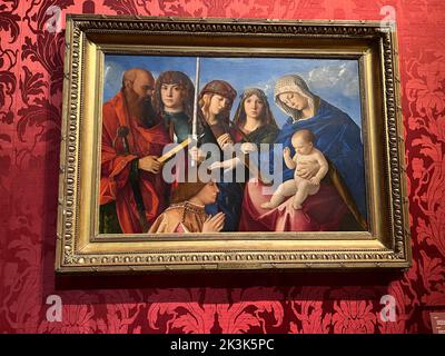 Attributed to Marco Bello - Virgin and Child Blessing a Kneeling Donor ...