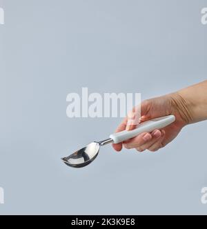 Empty metal scoop on white background, top view Stock Photo - Alamy